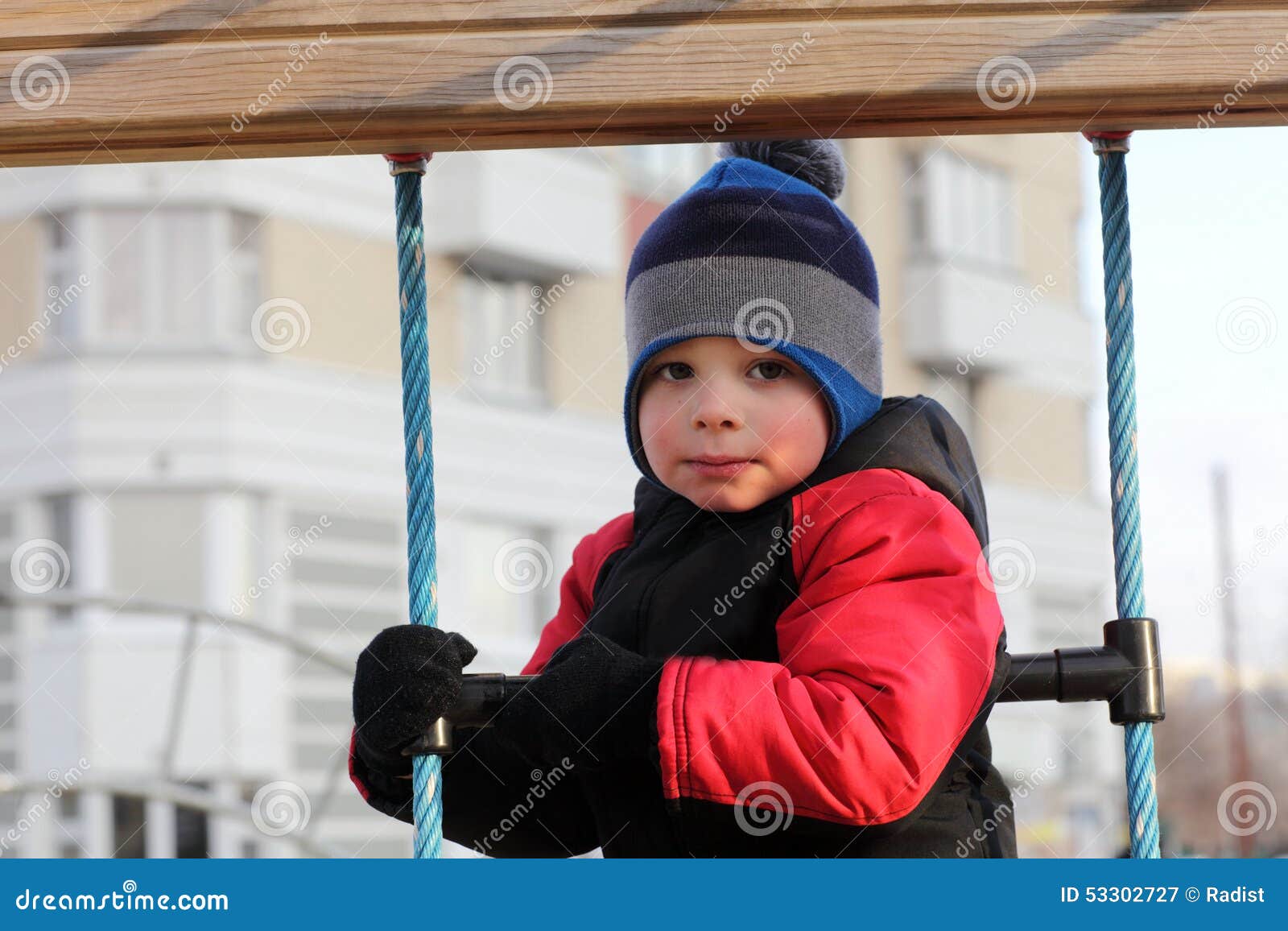 Boy at playground stock image. Image of jacket, male - 53302727