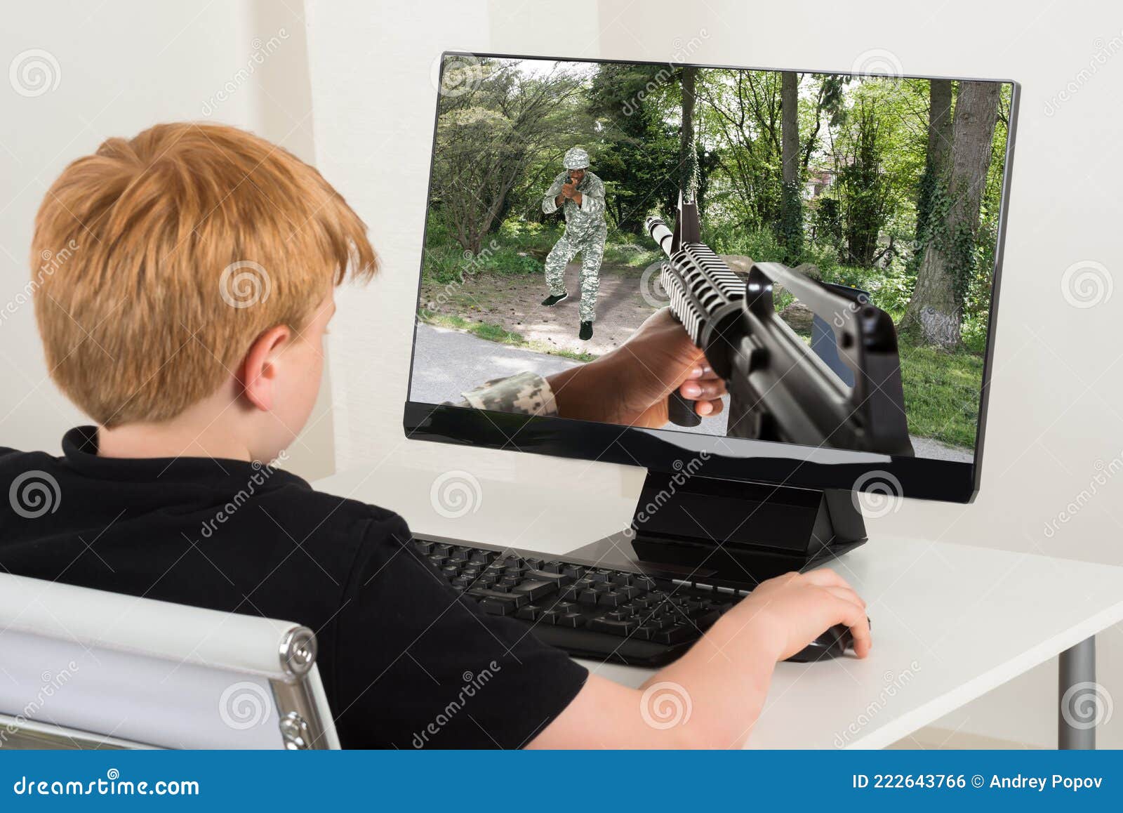 Man Playing Computer Game On Custom Made Desktop With Joypad, Keyboard ...