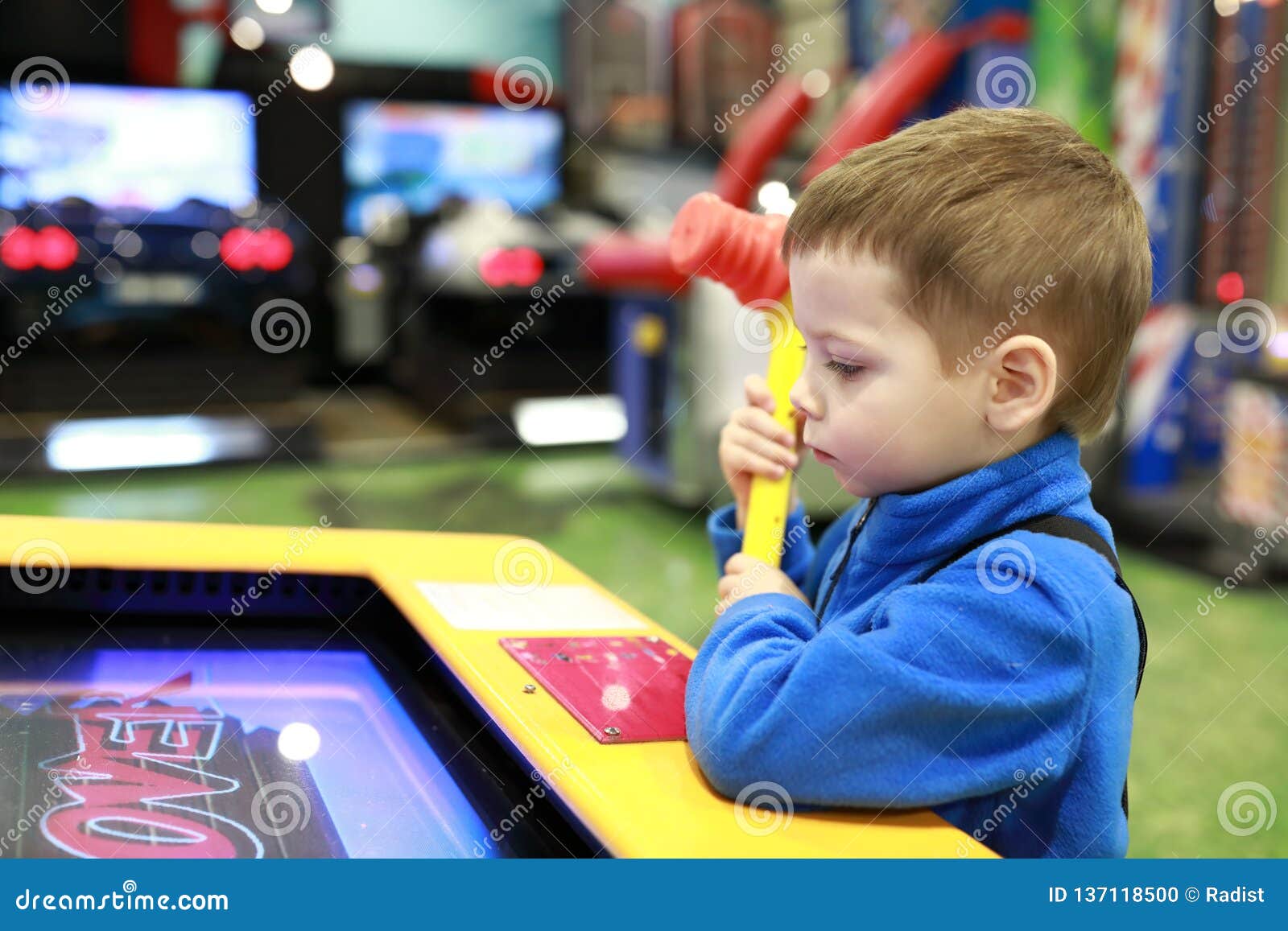 Boy Playing Arcade Game with Hammer Stock Photo - Image of concept ...