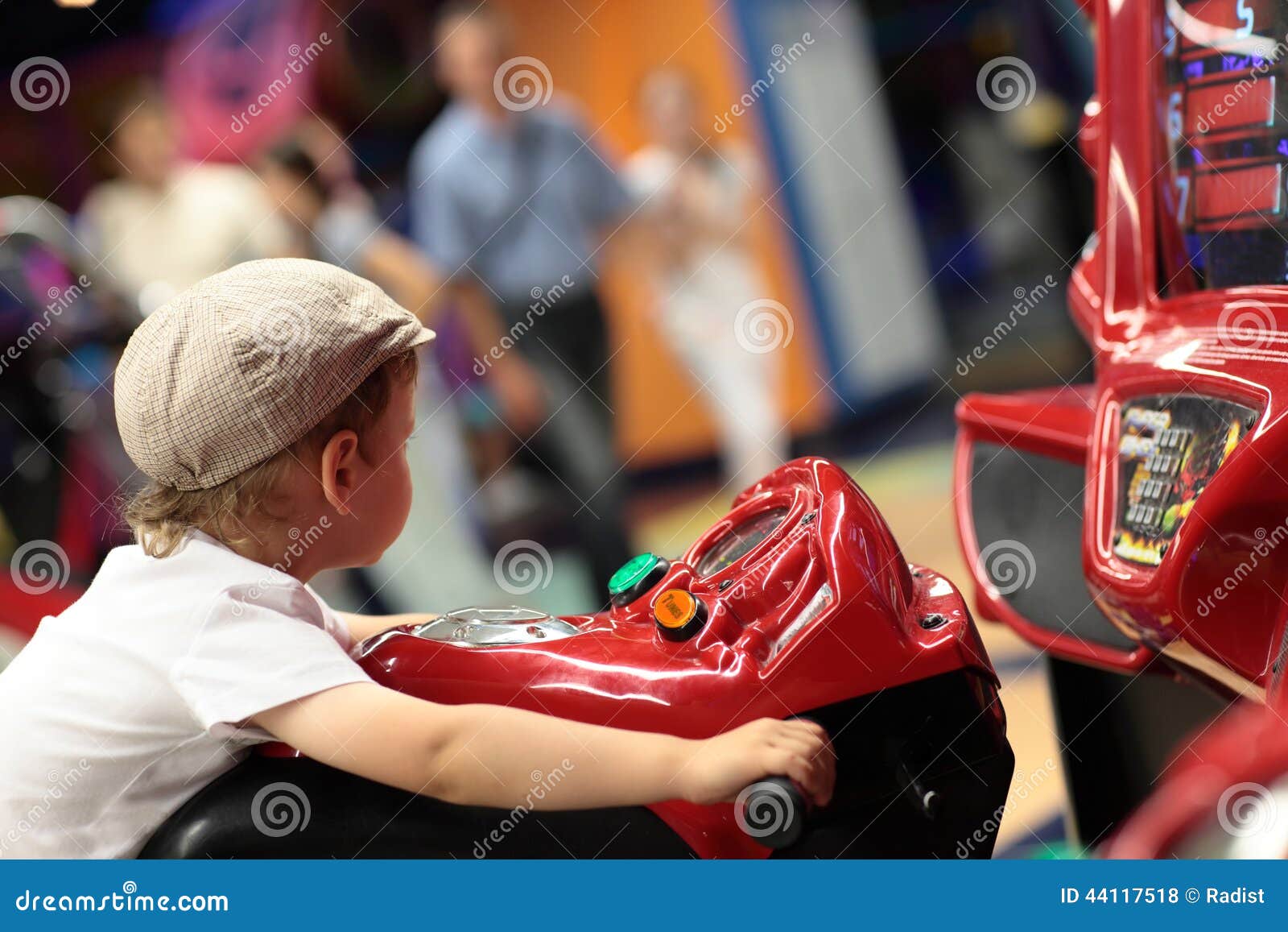 Boy Playing Arcade Simulator Machine Stock Photo - Image of little ...