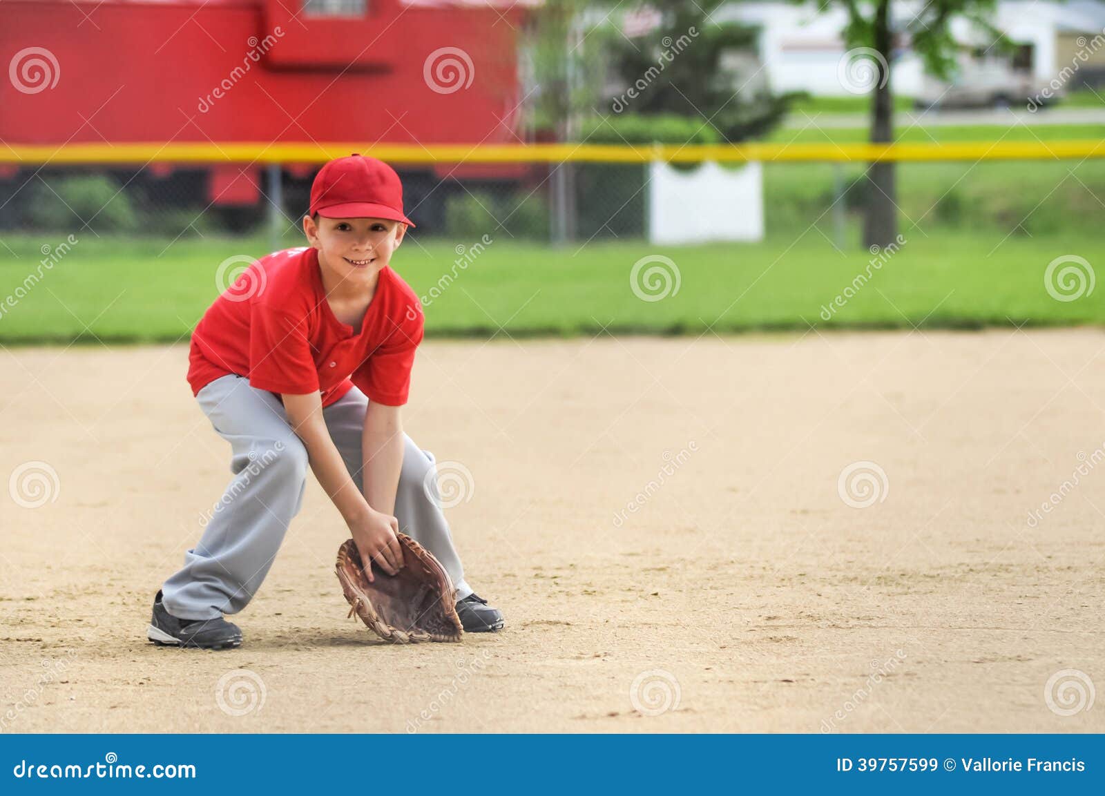 Boy playing baseball stock image. Image of field, uniform - 39757599