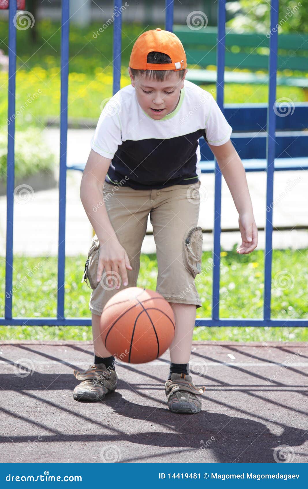 Boy playing basketball stock image. Image of leisure - 14419481