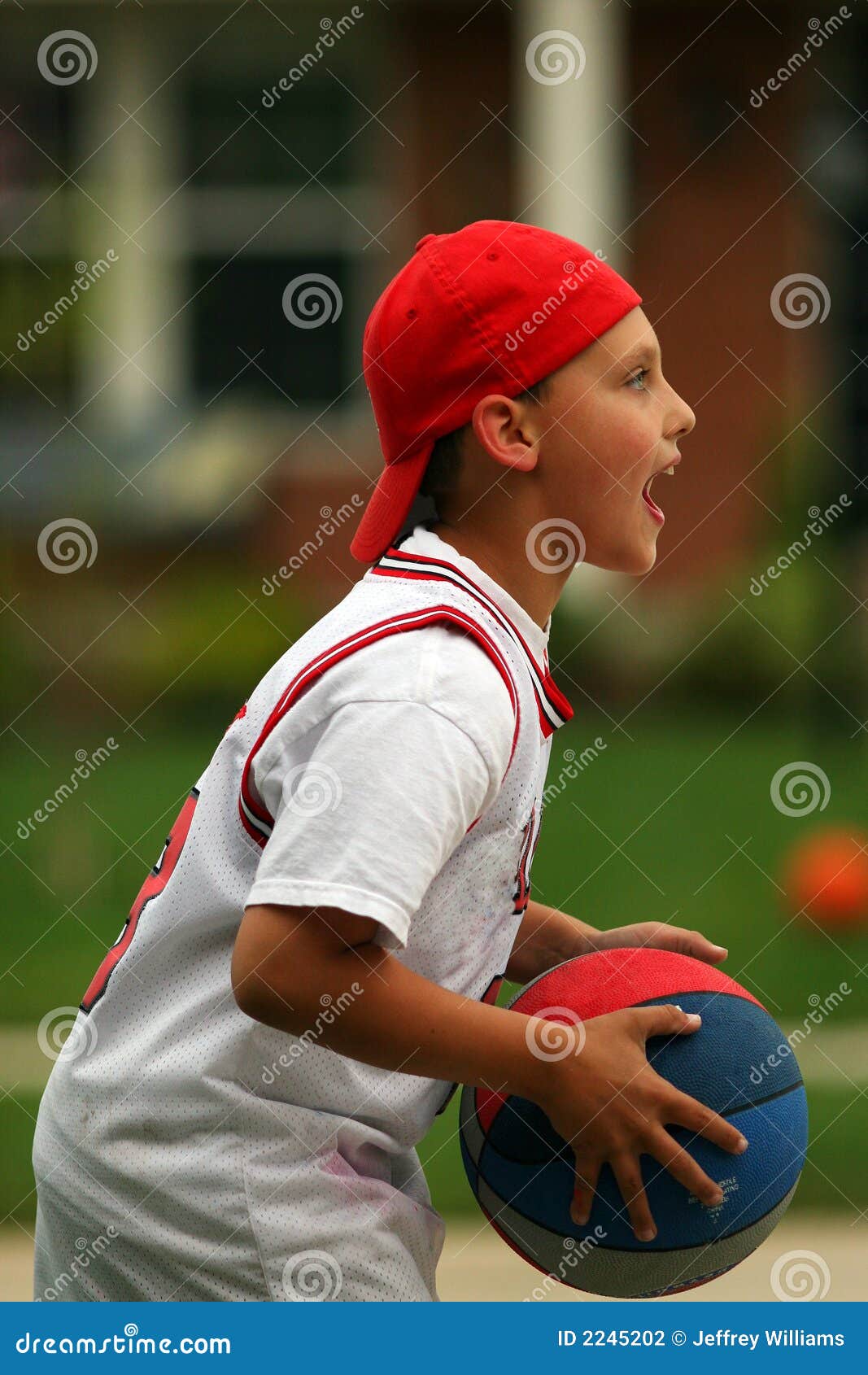 Boy playing basketball stock photo. Image of eyes, energy - 2245202