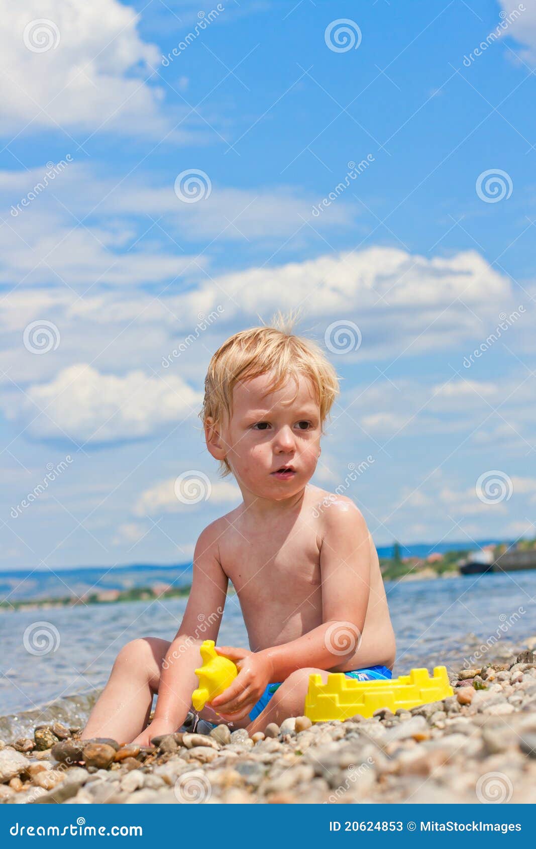 Boy playing on the beach stock image. Image of caucasian - 20624853