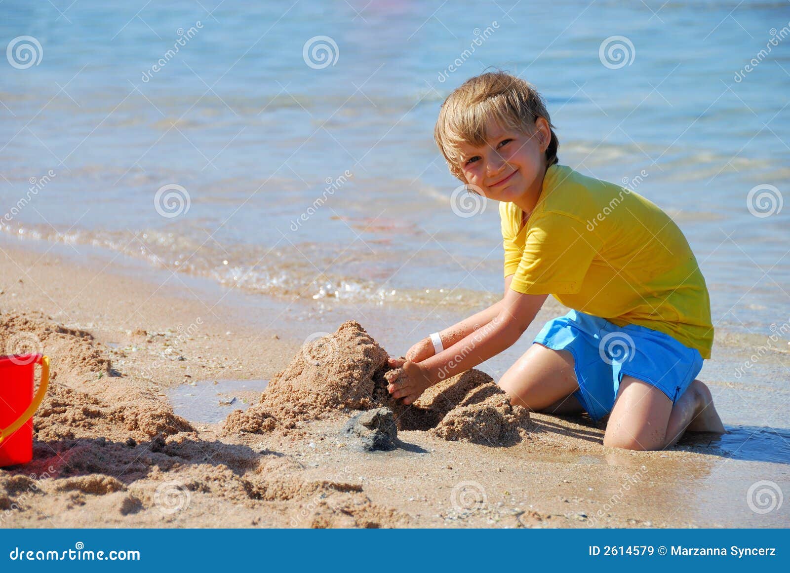 Boy playing on the beach stock image. Image of happy, beach - 2614579