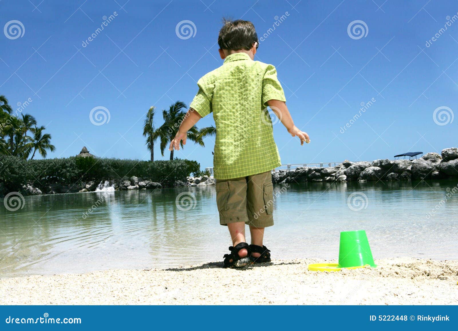 Boy playing on beach stock photo. Image of plays, sunny - 5222448