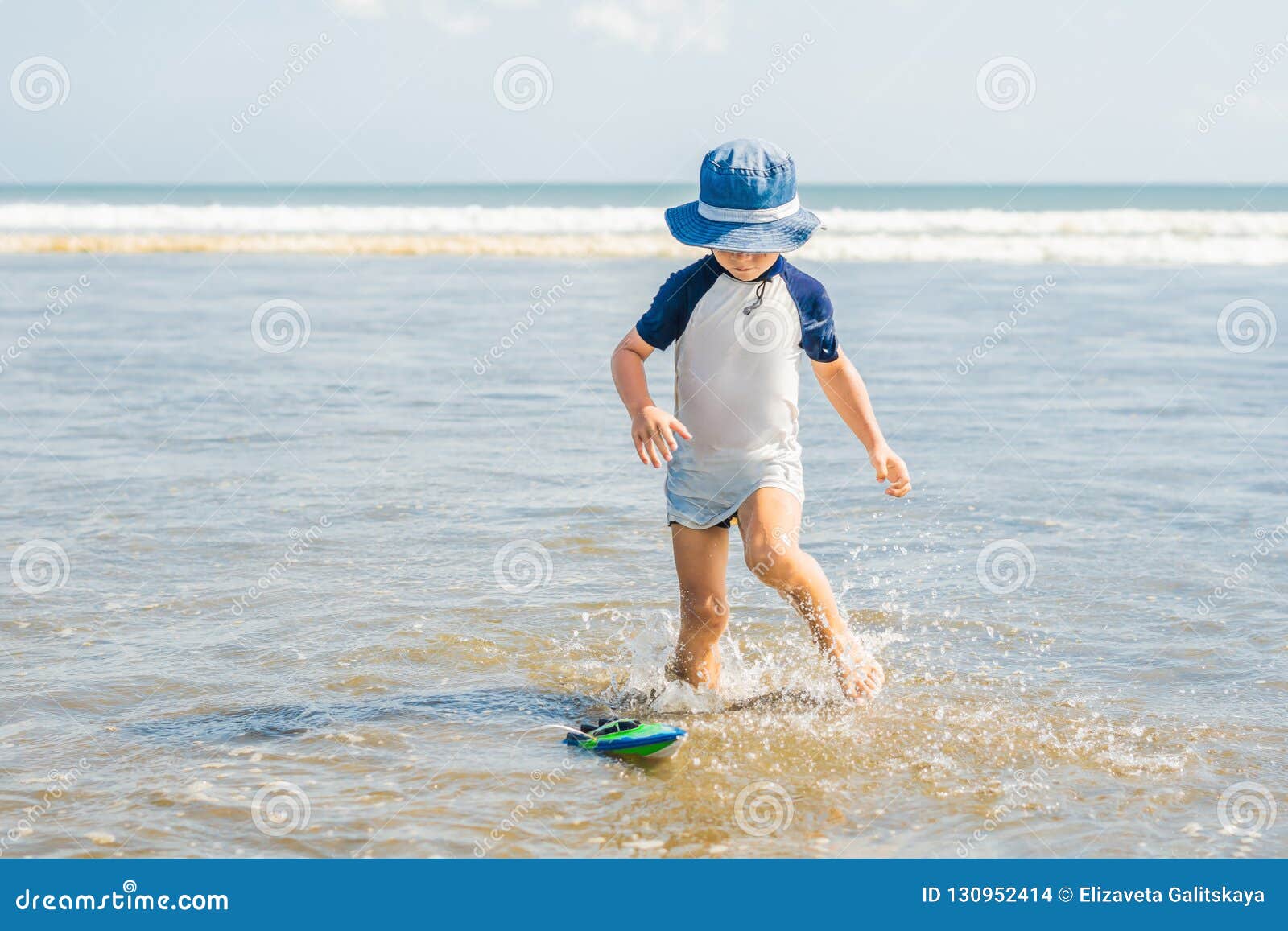 Boy Playing on the Beach in the Water Stock Photo - Image of exotic ...