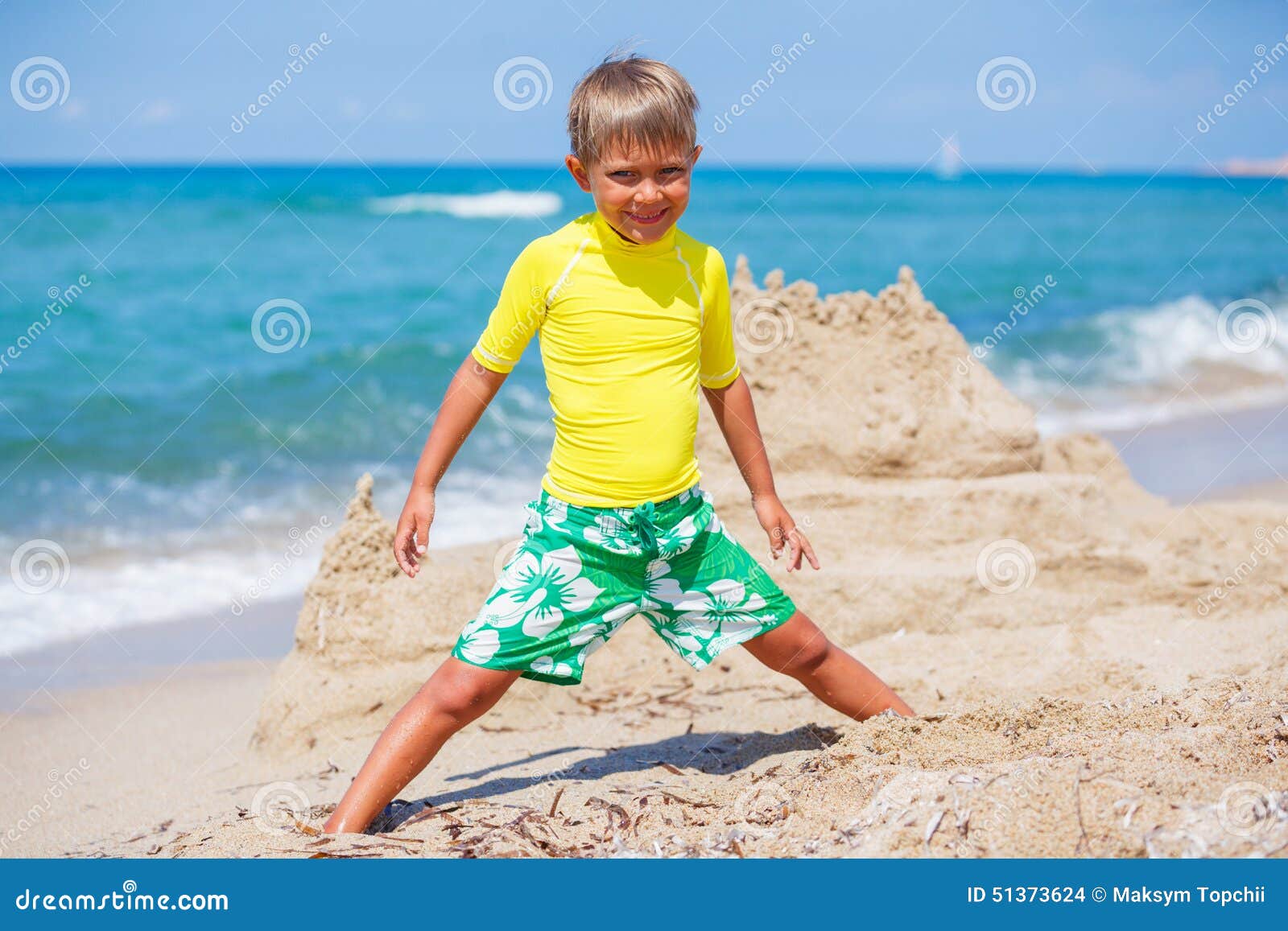 Boy playing on the beach stock photo. Image of happiness - 51373624