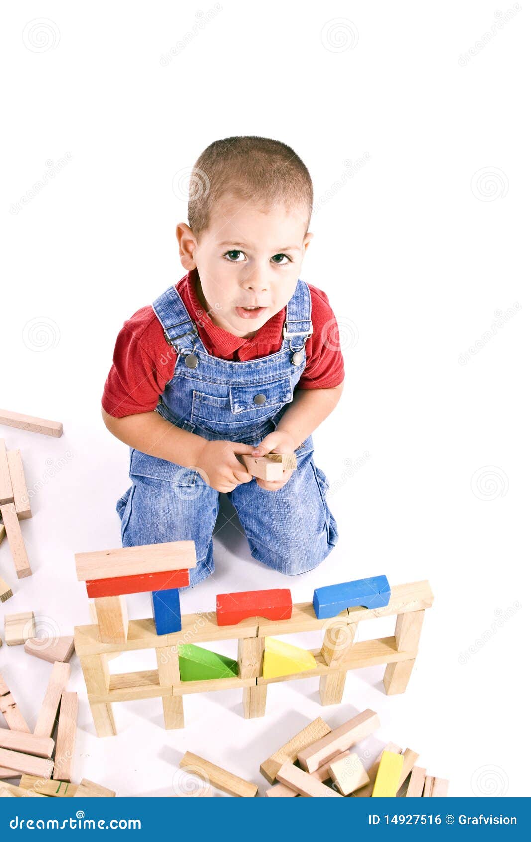 Boy playing with blocks stock photo. Image of little - 14927516
