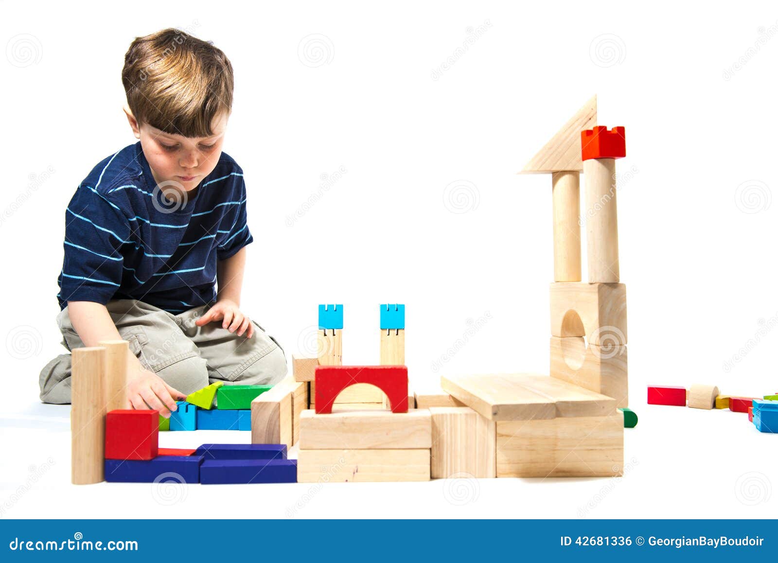 Boy playing with blocks stock photo. Image of engineering - 42681336