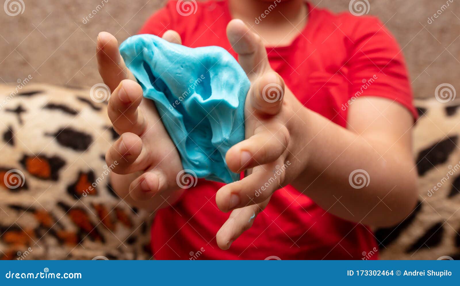 The Boy is Playing with a Blue Slime Stock Photo - Image of hands ...
