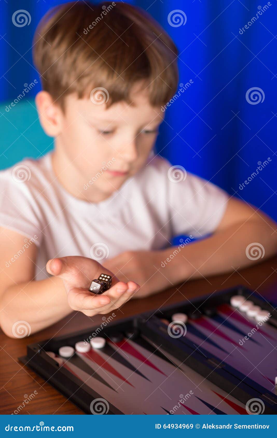 Boy Playing a Board Game Called Backgammon Stock Image - Image of ...