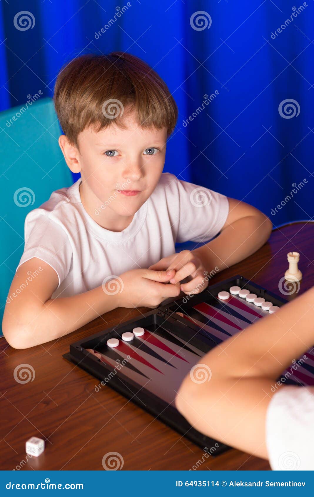 Boy Playing a Board Game Called Backgammon Stock Photo - Image of ...