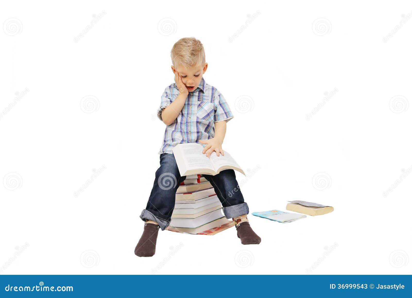 Boy playing with books stock image. Image of preschooler - 36999543