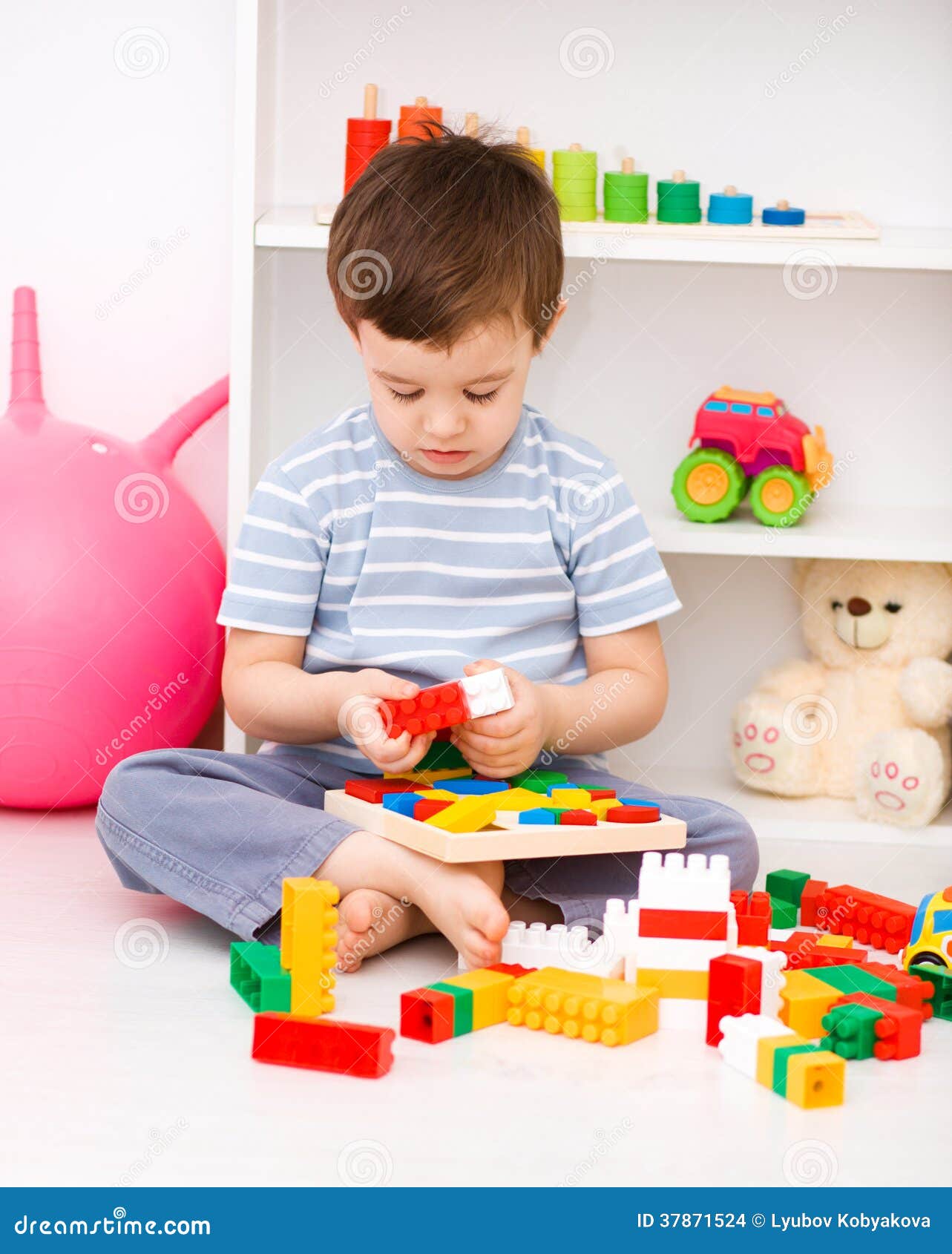 Boy is Playing with Building Blocks Stock Photo - Image of closeup ...