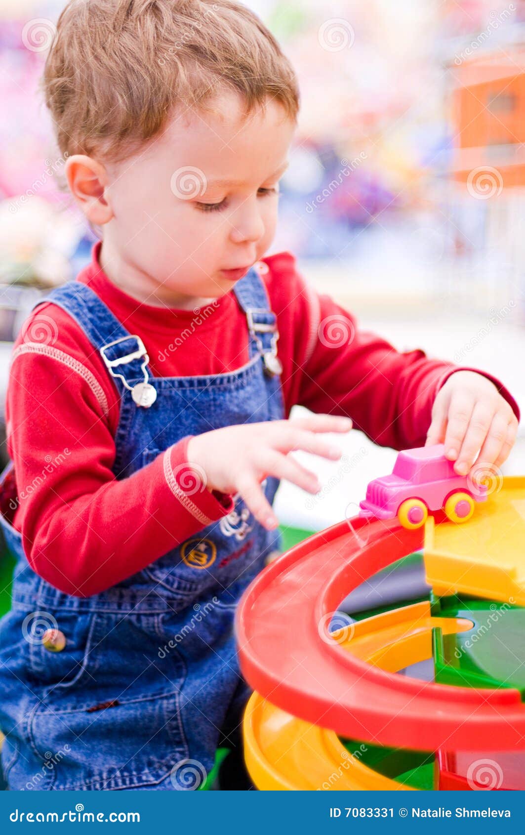 Boy playing with car stock image. Image of color, inside - 7083331