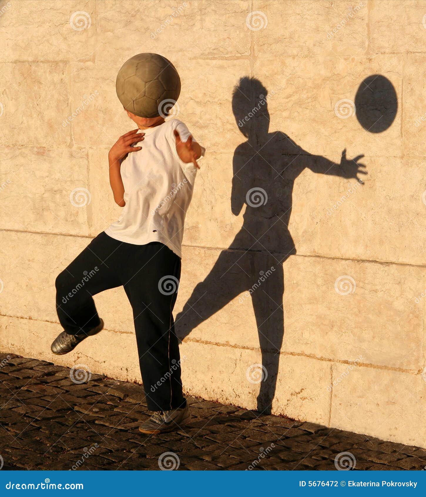 Boy Playing Catch with His Shadow Stock Photo - Image of jump, fidget ...