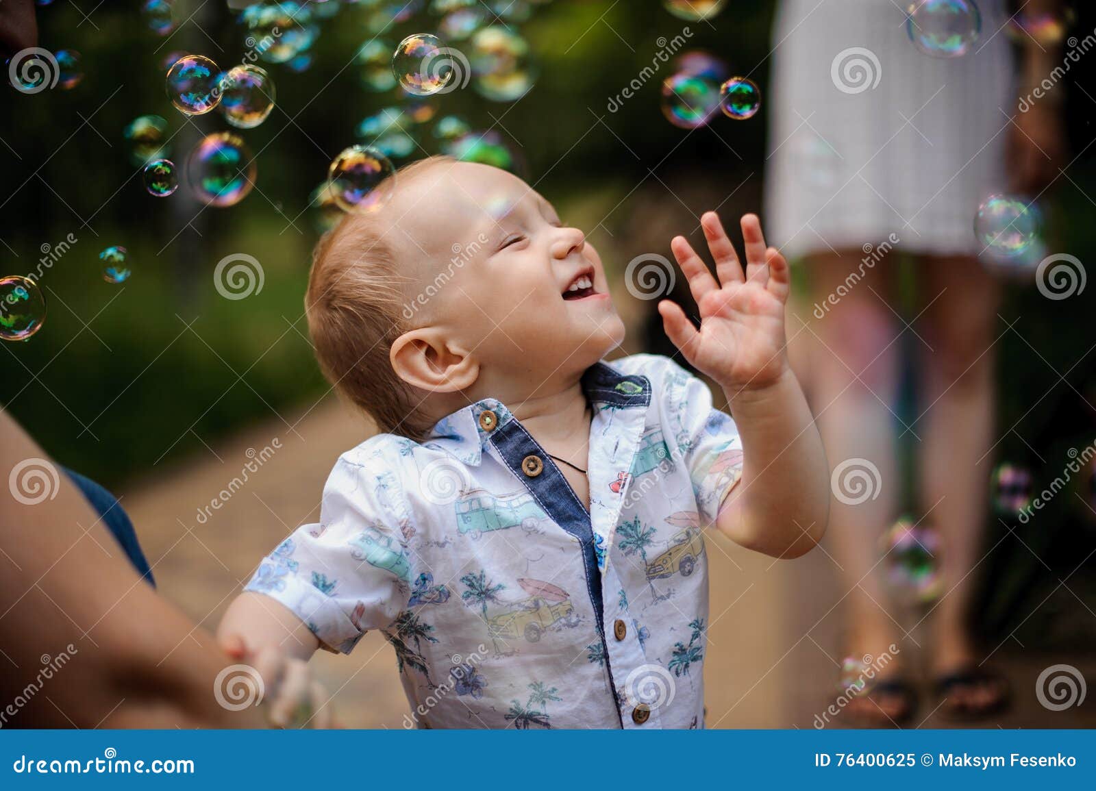 Boy Playing Catch Soap Bubbles Outdoors Stock Image - Image of copy ...