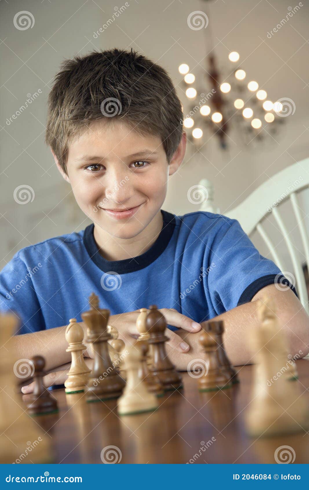 Boy playing chess. stock photo. Image of child, photograph - 2046084