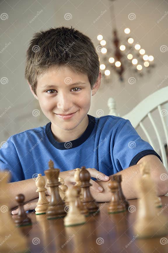 Boy playing chess. stock photo. Image of child, photograph - 2046084