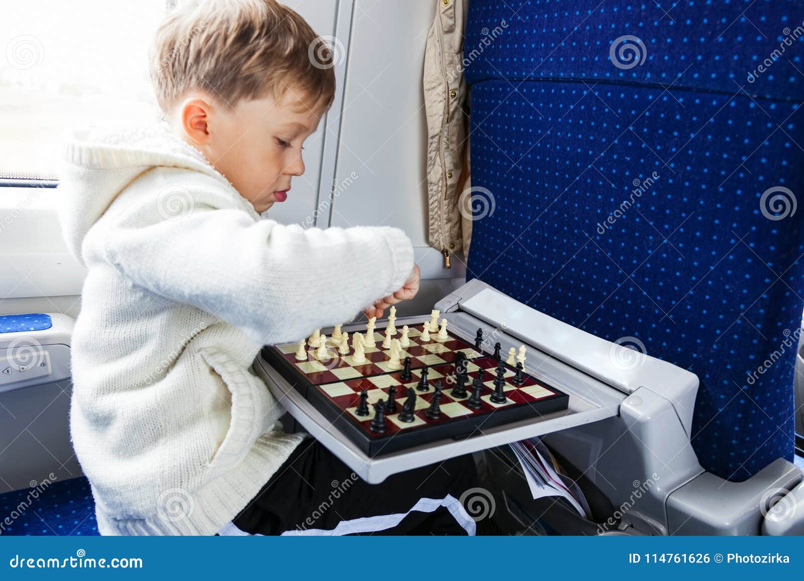 Boy Playing Chess Sitting in Train Stock Photo - Image of child ...