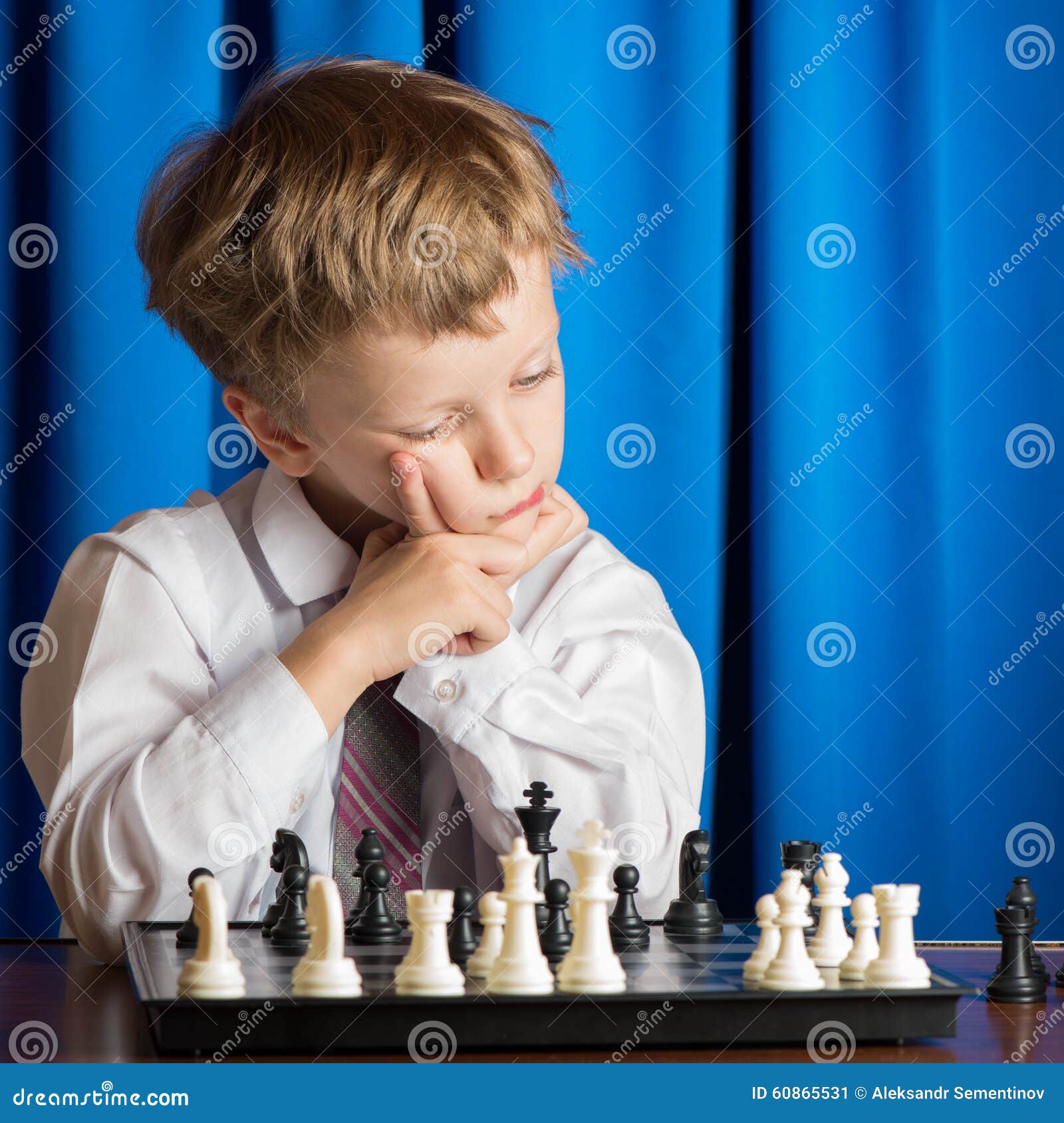 Boy playing chess stock image. Image of chess, indoors - 60865531