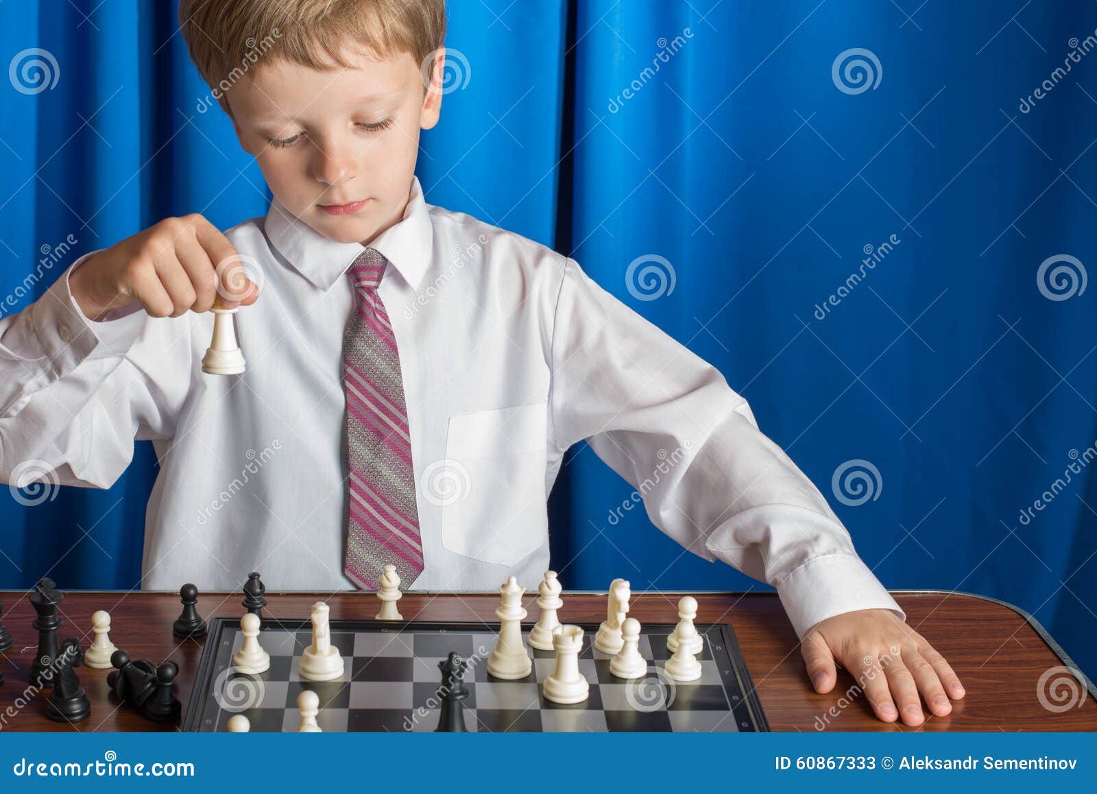 Boy playing chess stock image. Image of activity, competitive - 60867333