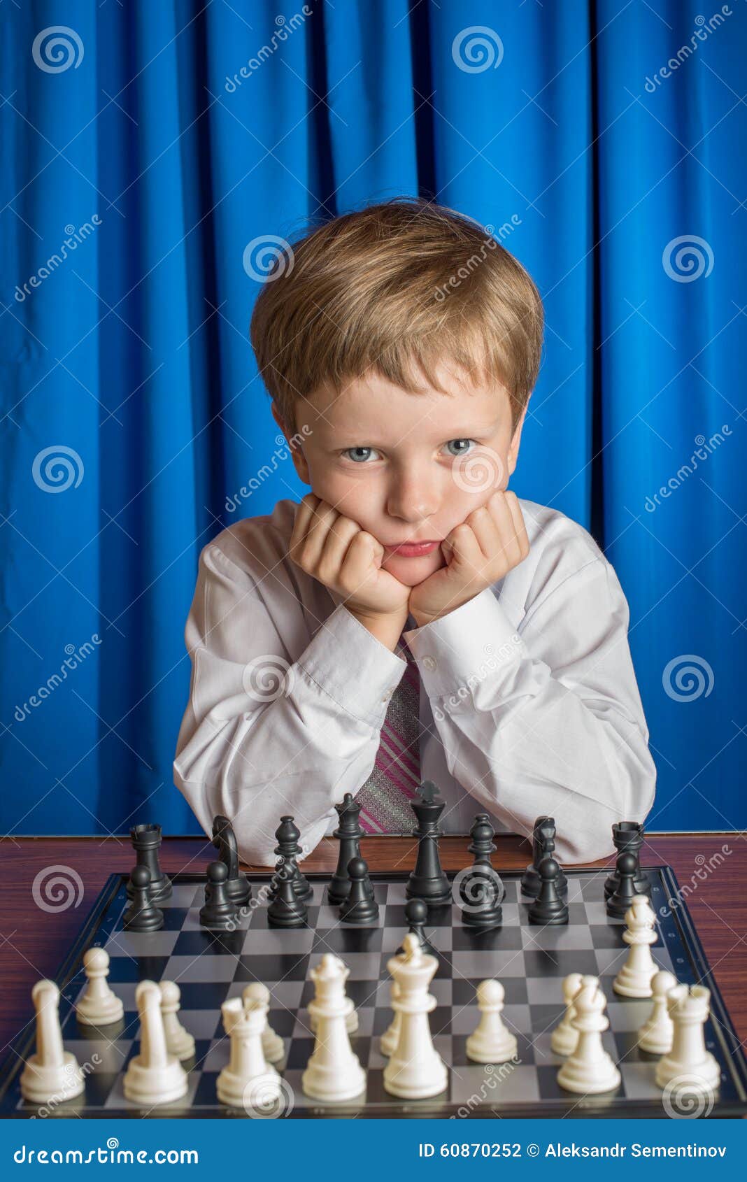 Boy playing chess stock photo. Image of lifestyles, boys - 60870252