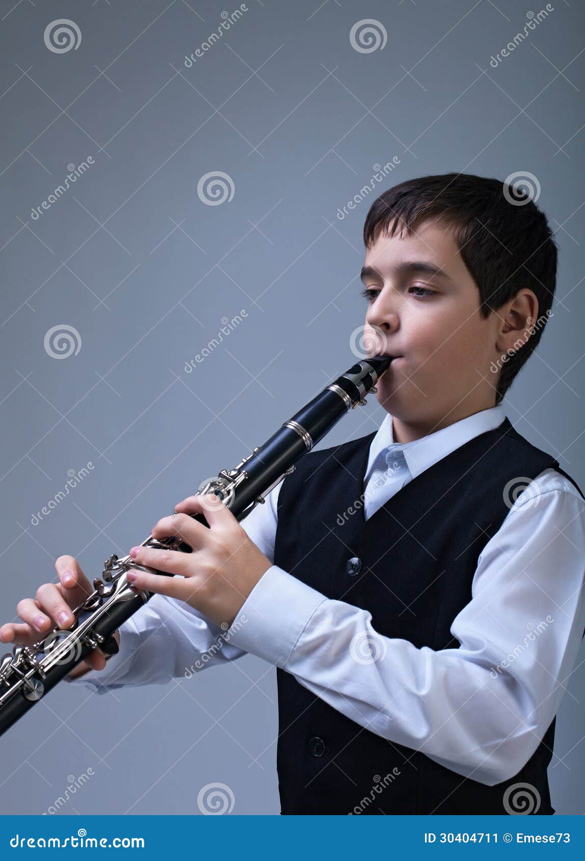 Boy Playing on the Clarinet Stock Image - Image of clarinet, woodwind ...