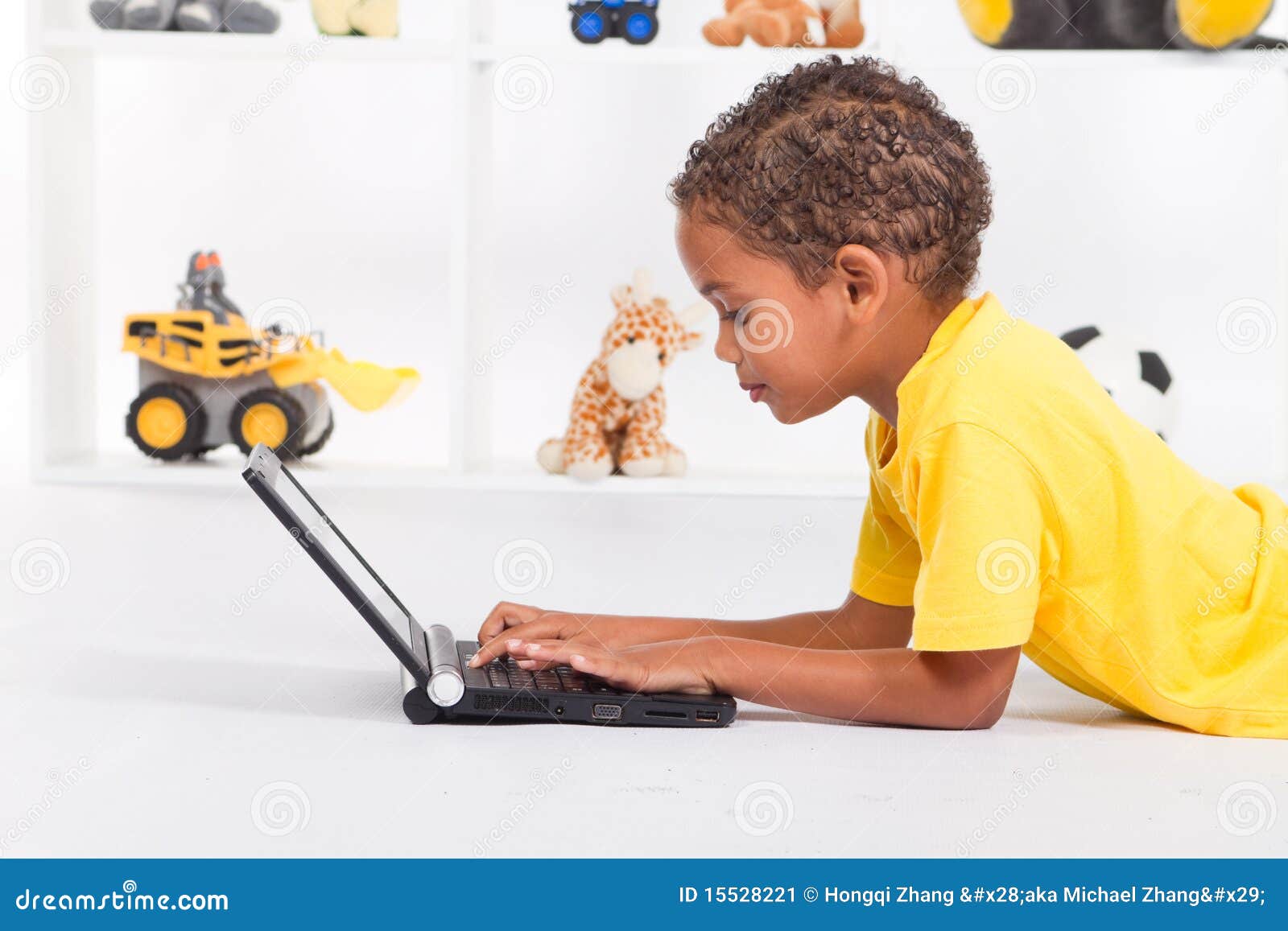 Boy playing computer stock image. Image of happy, laptop - 15528221