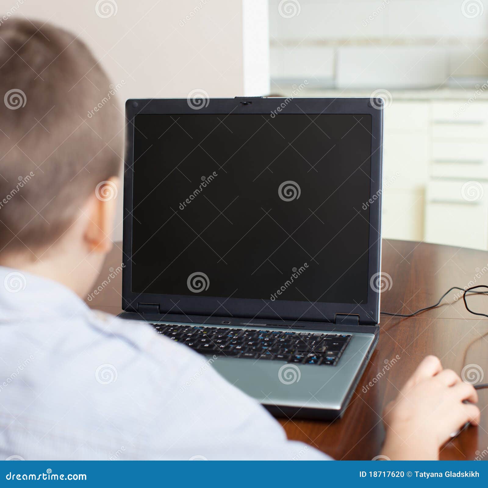 Boy playing a computer stock photo. Image of contemplation - 18717620