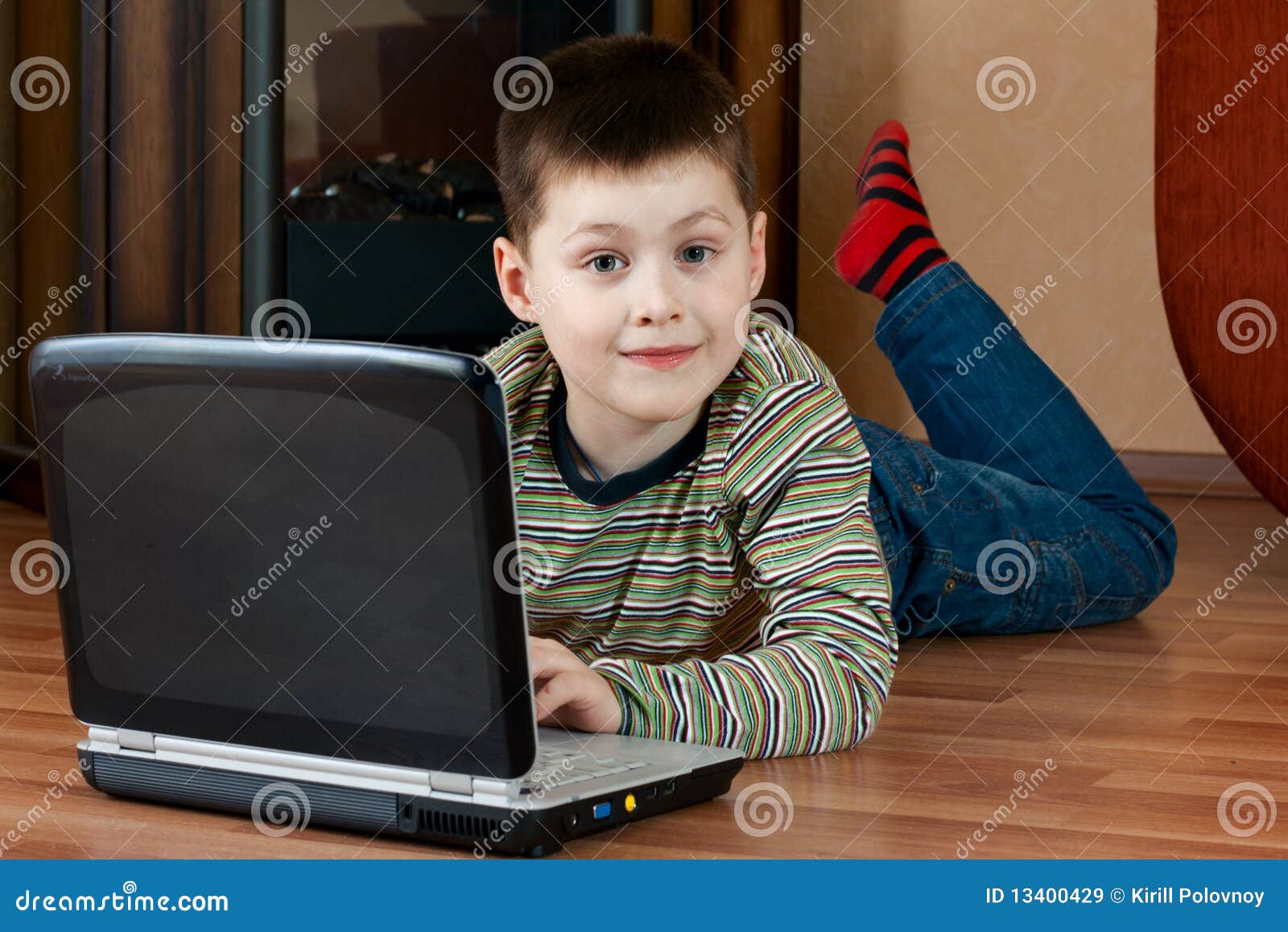 Boy playing computer game stock image. Image of face - 13400429
