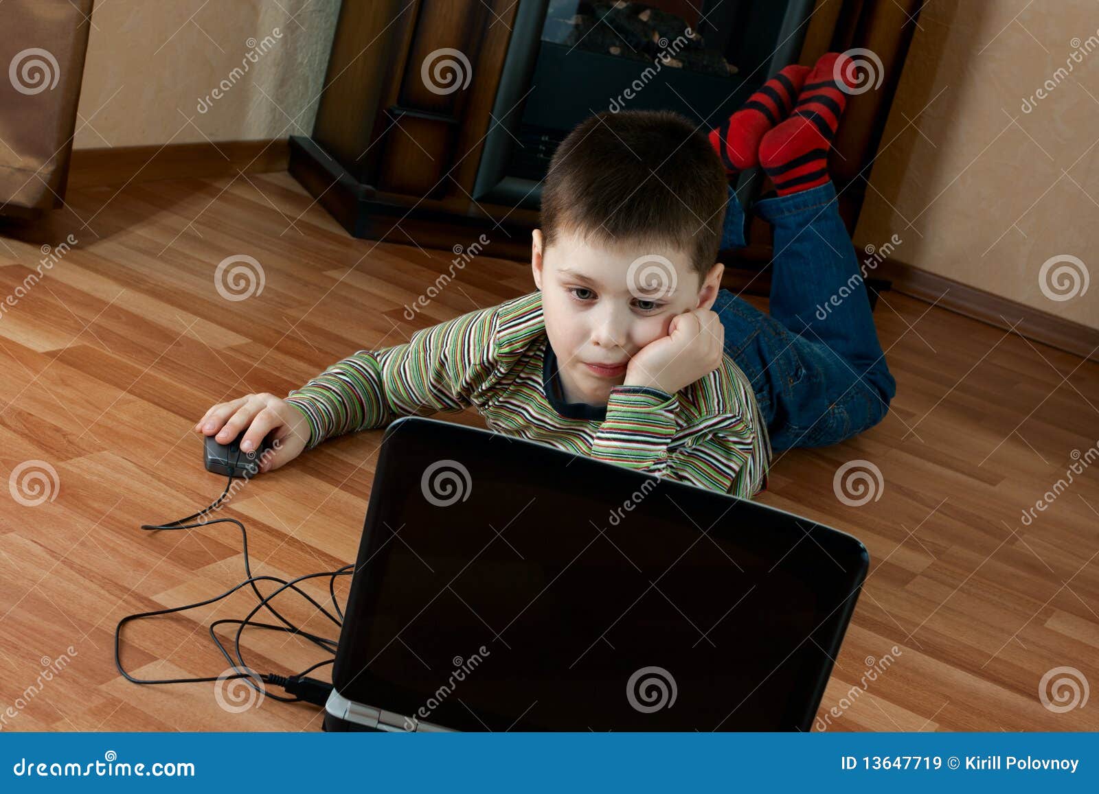 Boy playing computer game stock image. Image of education - 13647719