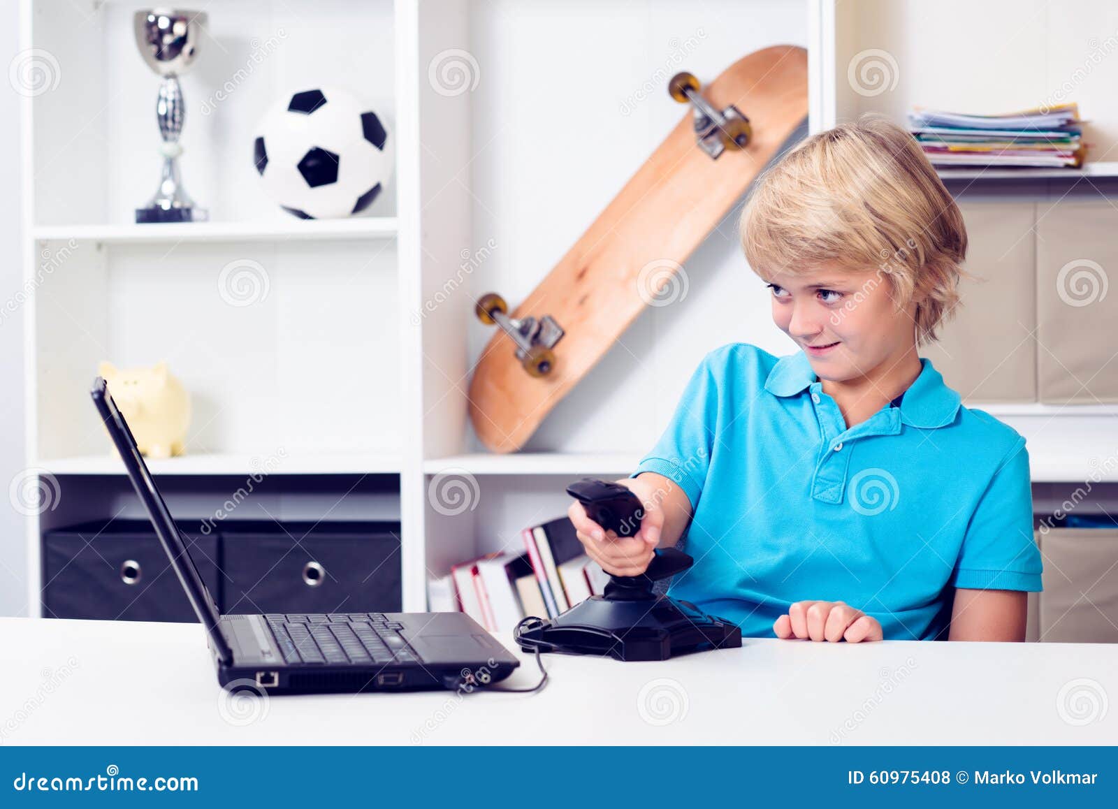 Boy is Playing Computer Game Stock Photo - Image of blond, home: 60975408