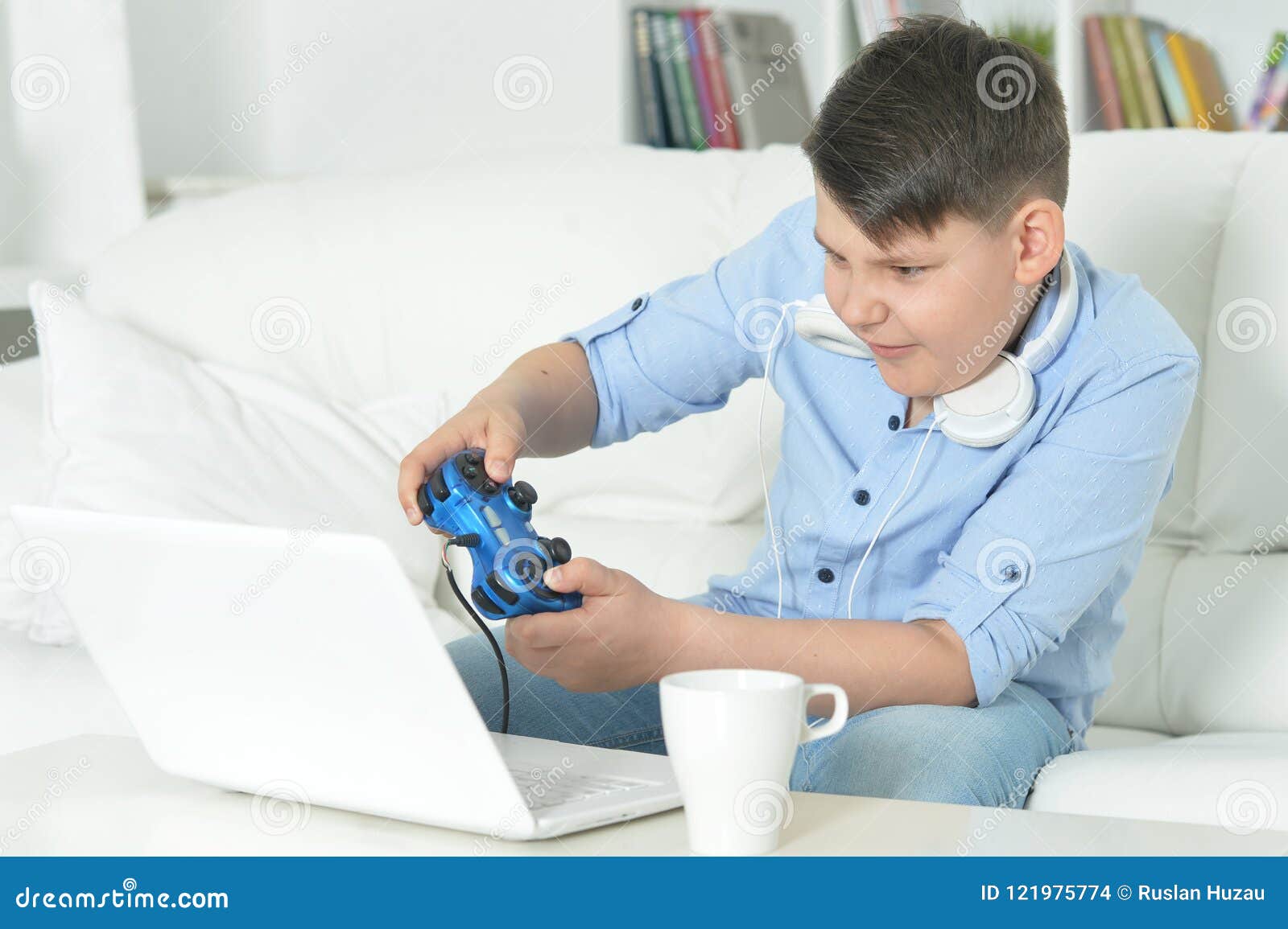 Boy Playing Computer Game with Laptop Stock Photo - Image of ...