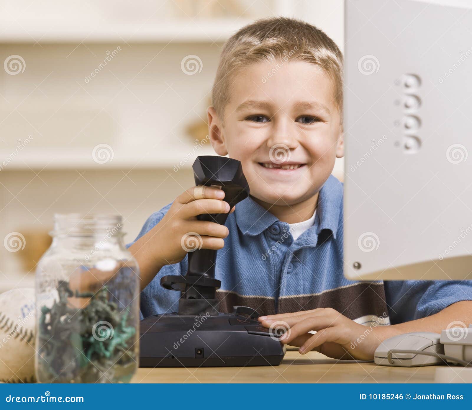 Boy Playing Computer Games stock photo. Image of home - 10185246