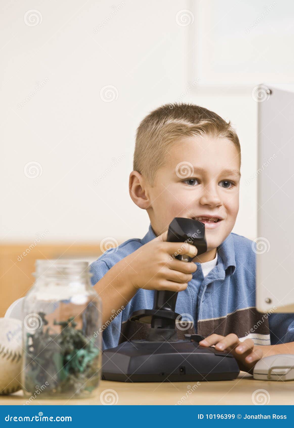 Boy Playing Computer Games stock image. Image of arcade - 10196399