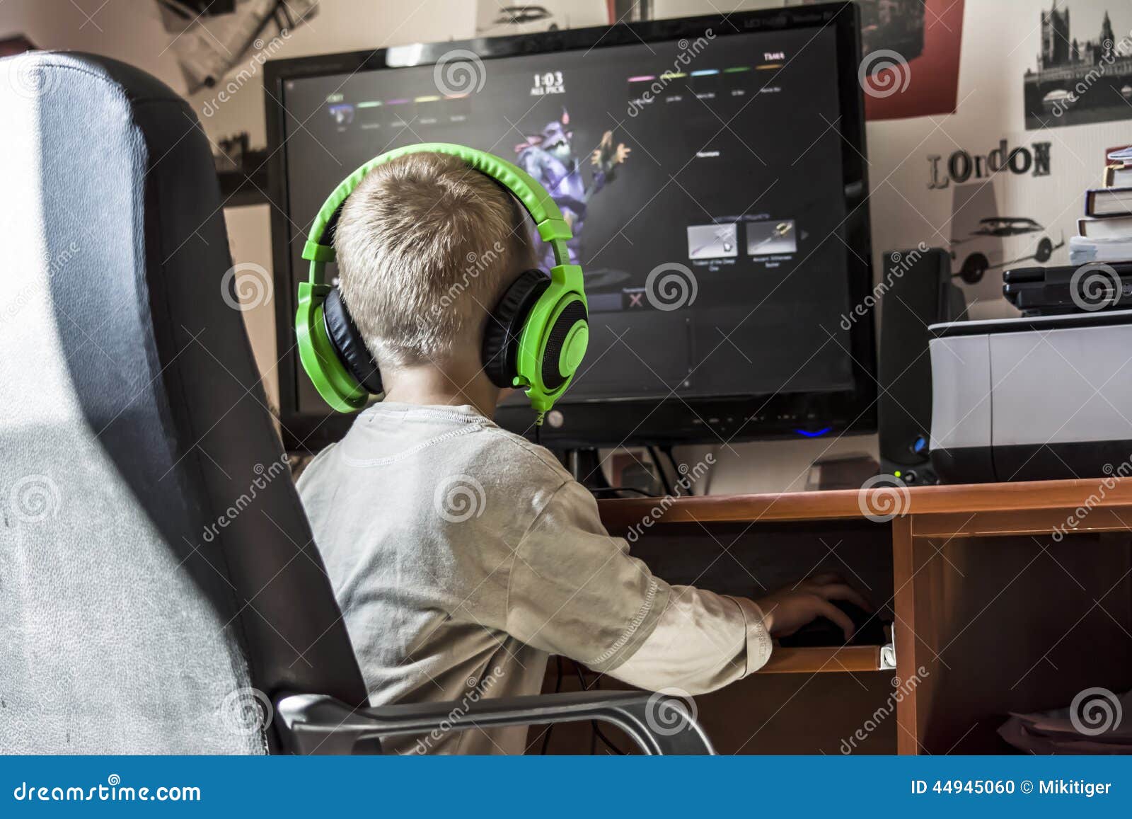 Boy playing computer stock photo. Image of gambling, game - 44945060