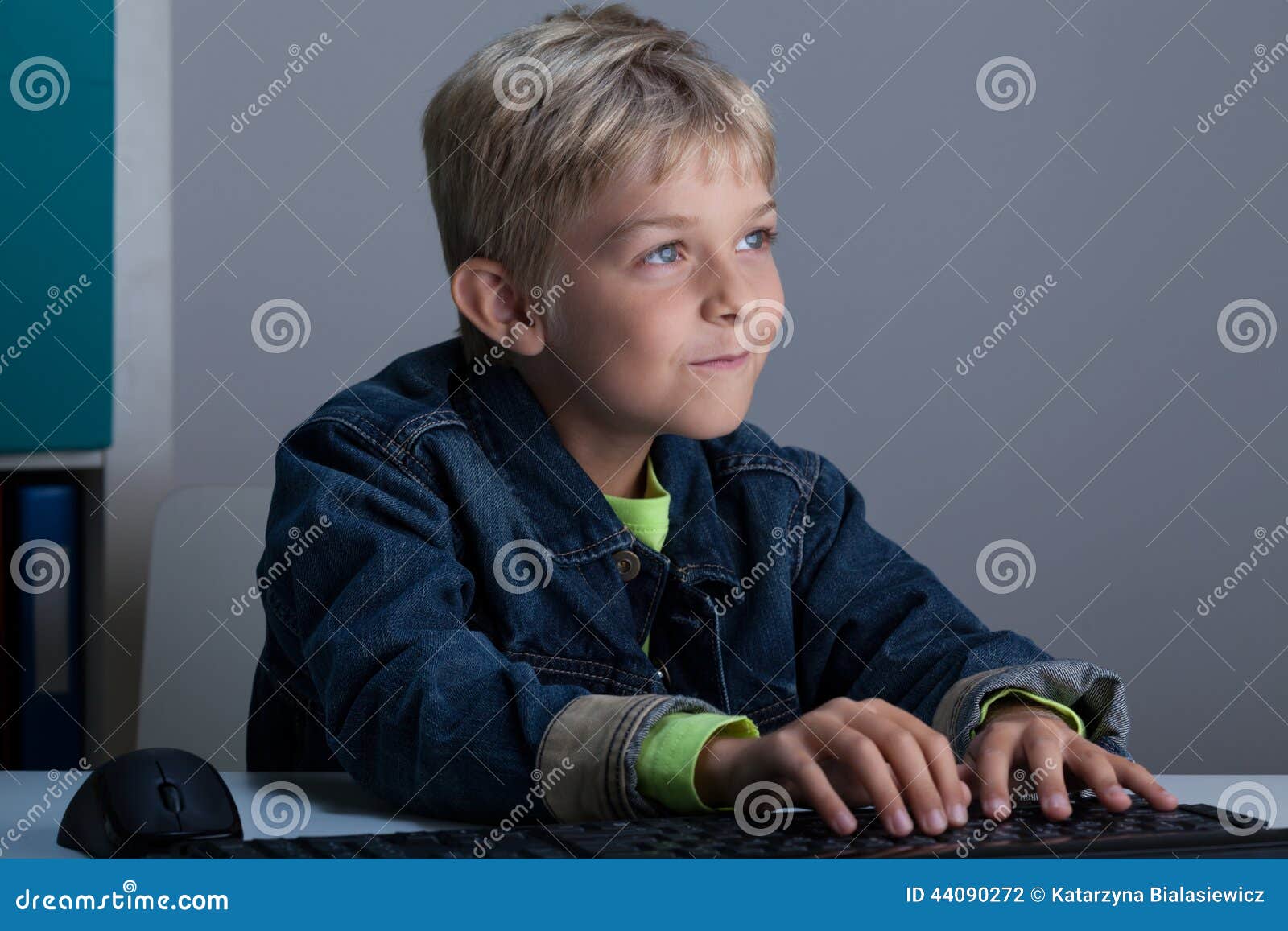 Boy playing on computer stock photo. Image of play, child - 44090272