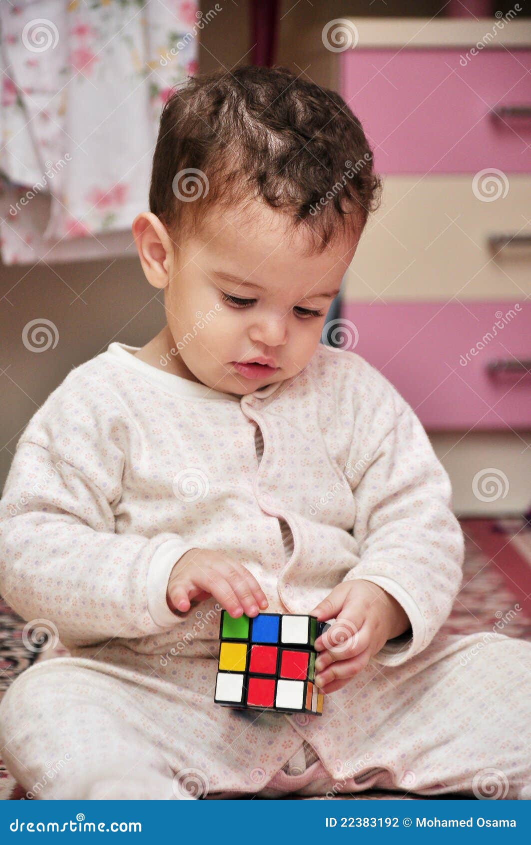 Boy Playing With Cube Toy Editorial Image | CartoonDealer.com #22383192