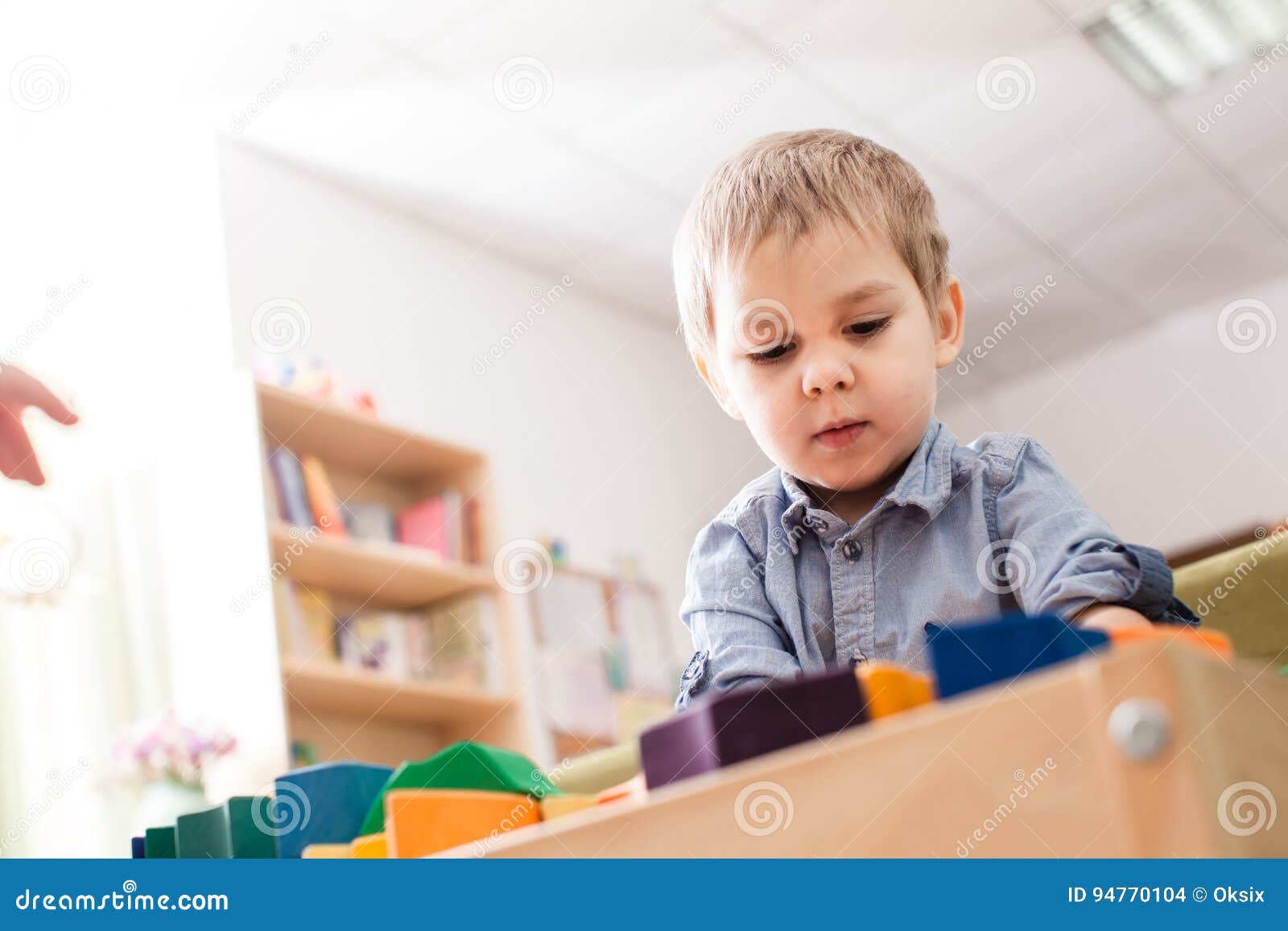 Boy playing with cubes stock photo. Image of adorable - 94770104