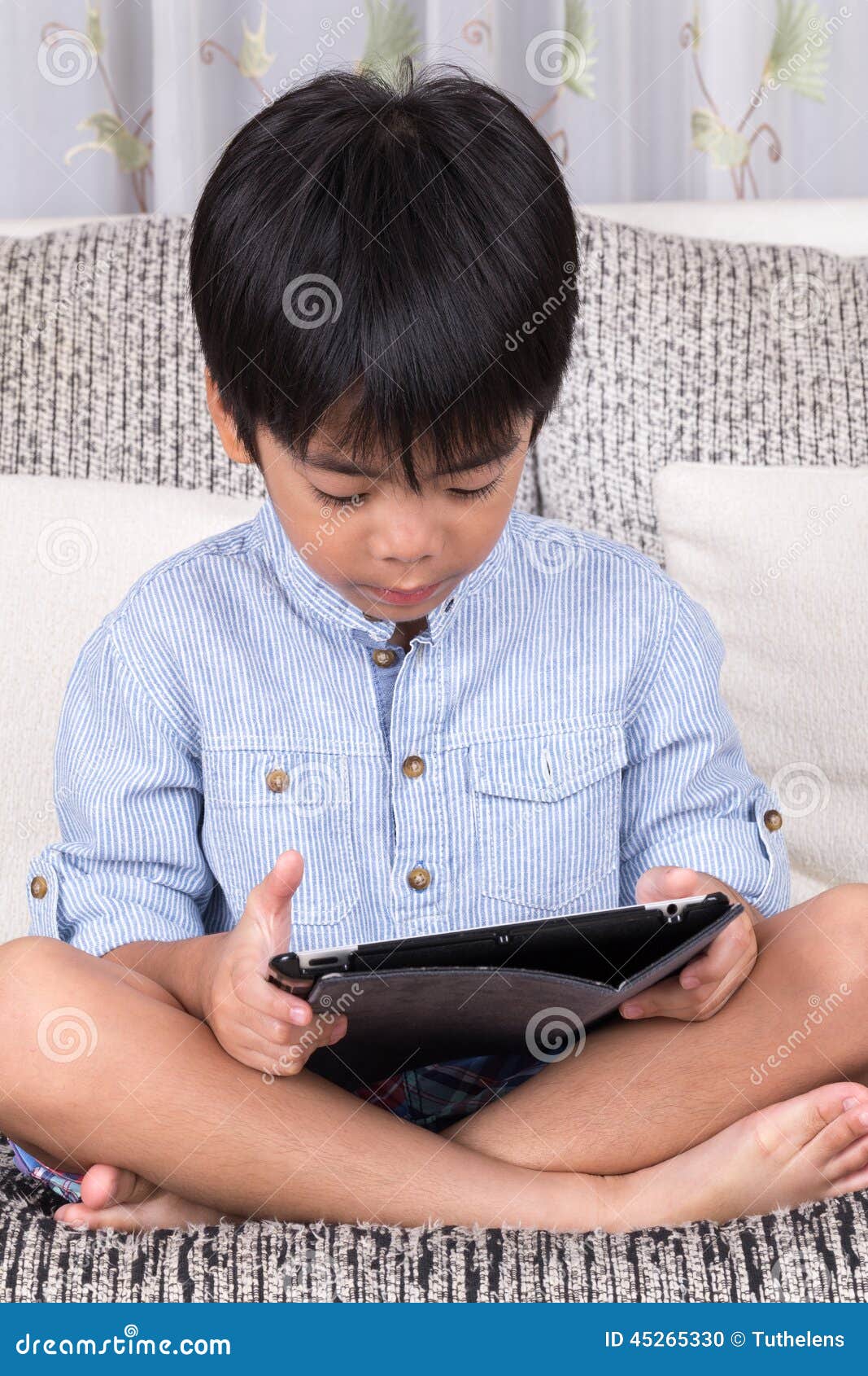 Boy playing digital tablet stock photo. Image of education - 45265330