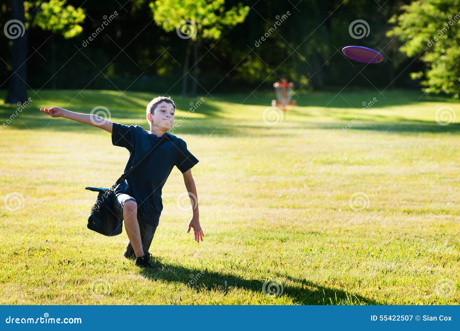 Boy playing disc golf stock image. Image of summer, outdoors - 55422507