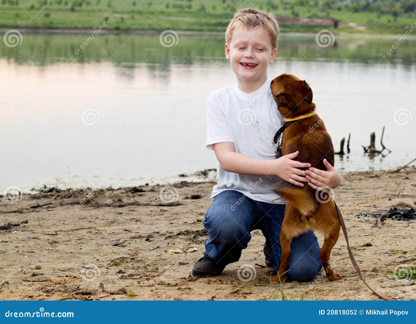 Boy playing with dog. stock photo. Image of attentive - 20818052