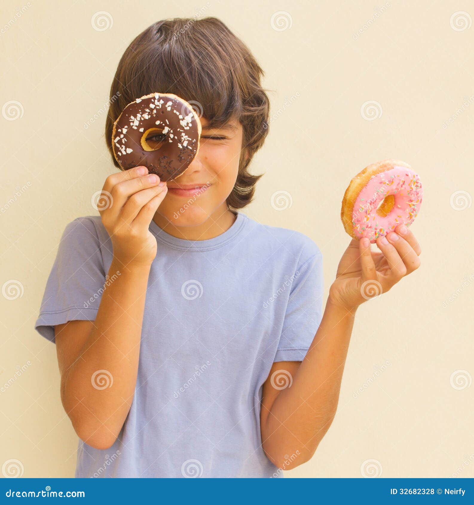 Boy playing with donuts stock photo. Image of happy, childhood - 32682328