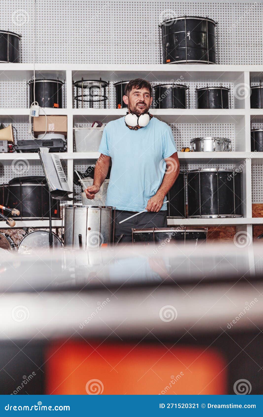 Boy Playing the Drum Inside a Studio Surrounded by Drums Stock Image ...