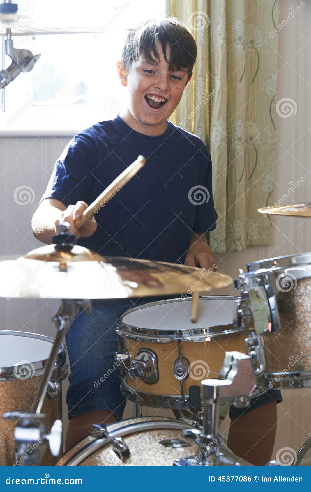 Boy Playing Drum Kit at Home Stock Photo - Image of learning, caucasian ...