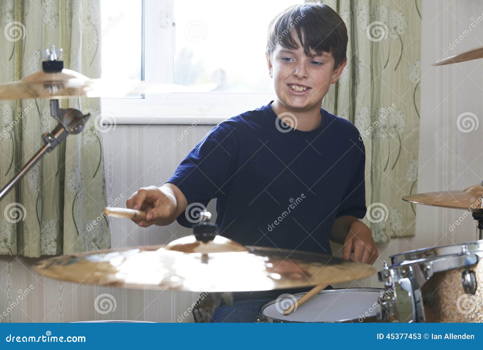 Boy Playing Drum Kit at Home Stock Image - Image of person, instrument ...