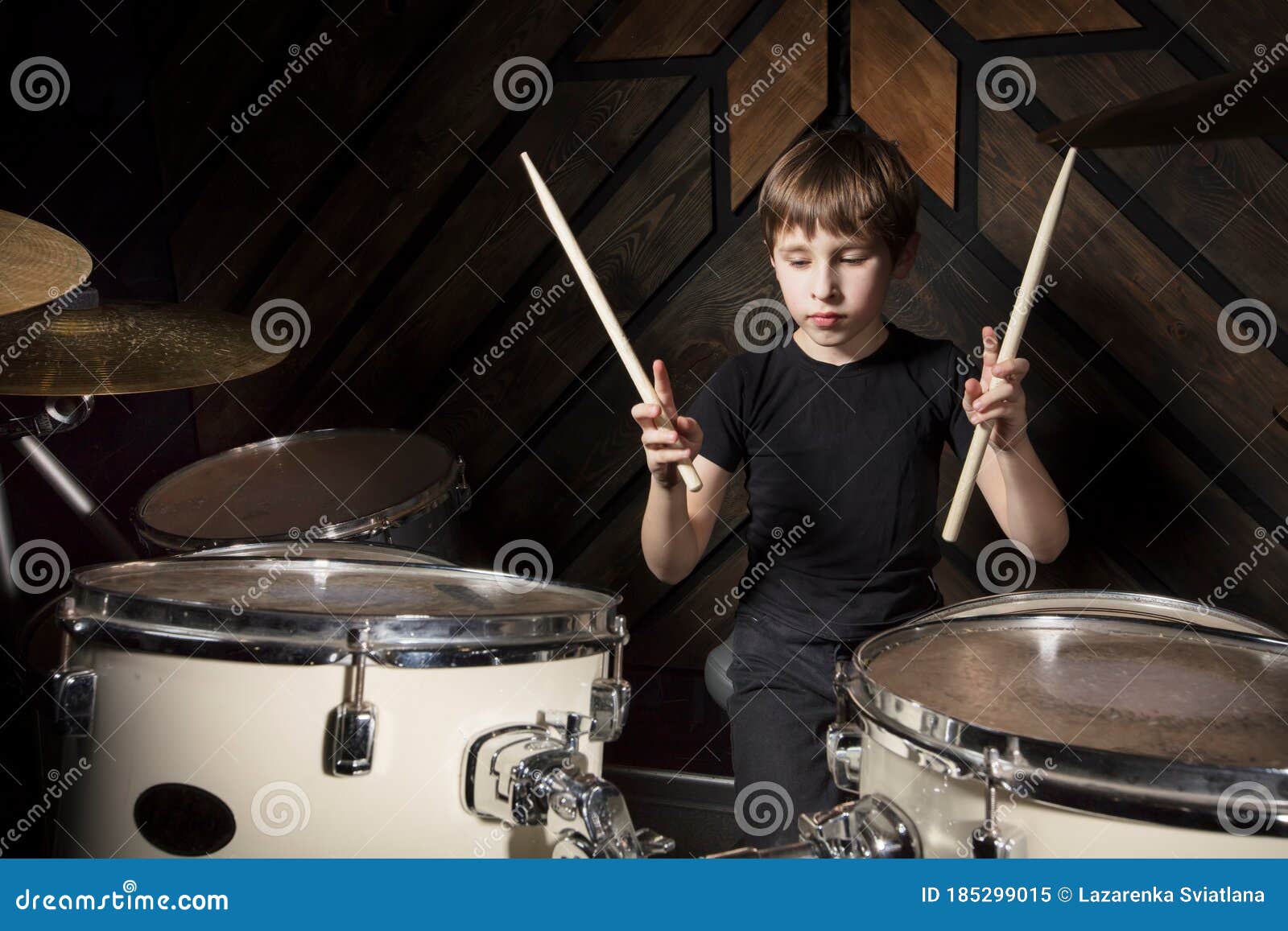 A Boy Is Playing With A Drumstick. Stock Image - Image of concert ... A Boy Is Playing With A Drumstick. Stock Image - Image of concert ...