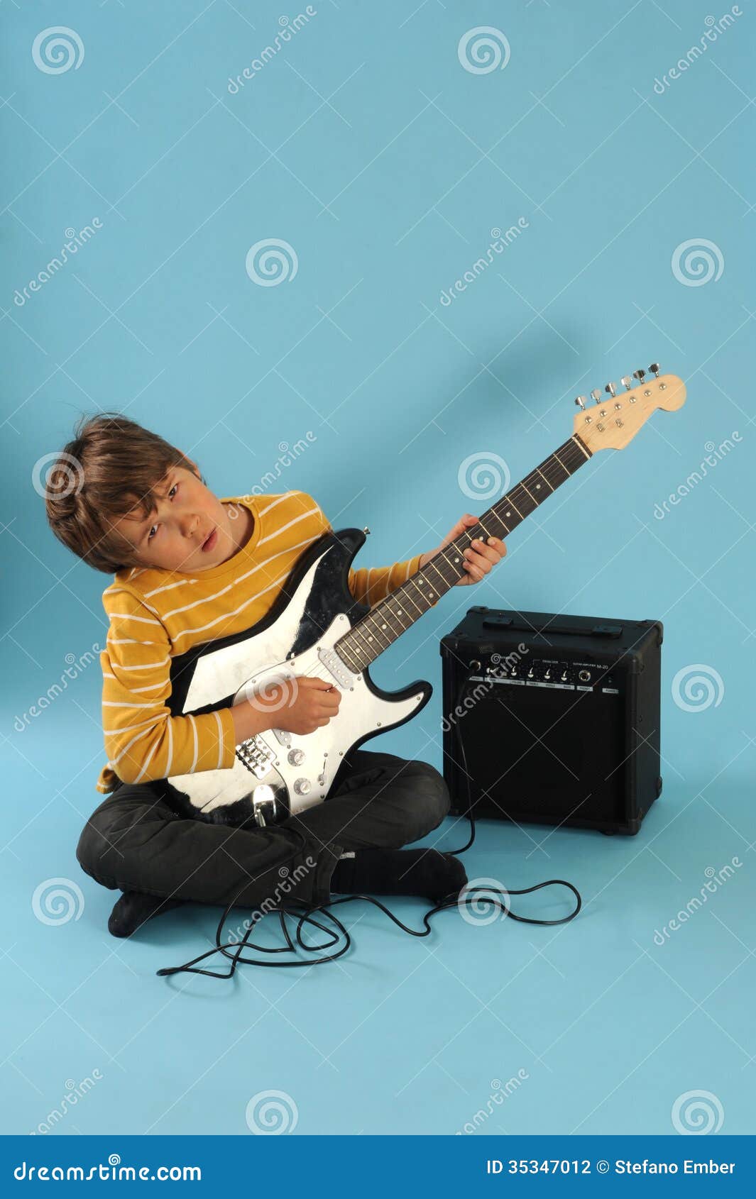 Boy Playing an Electric Guitar Stock Photo - Image of child, music ...